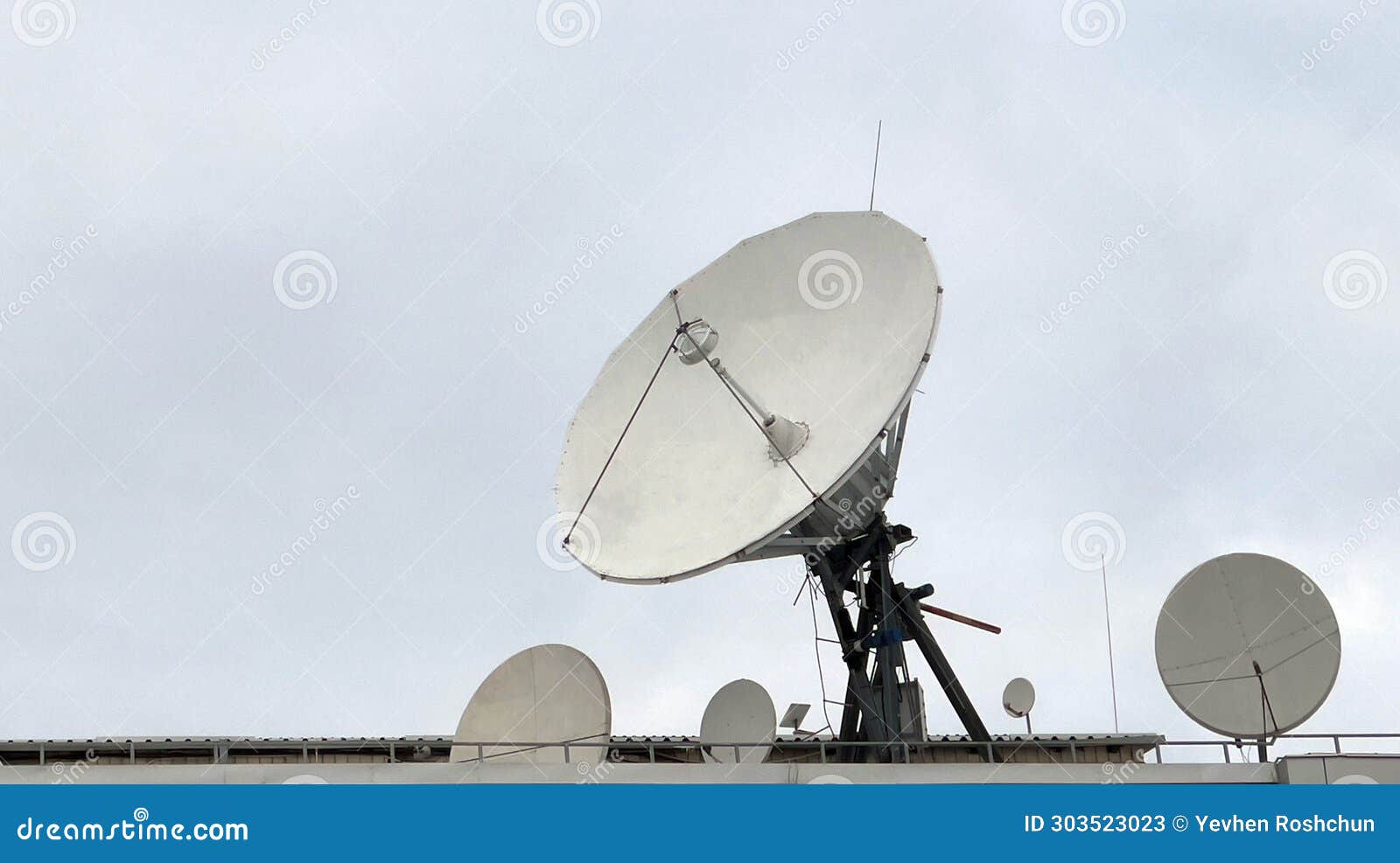 A Group of Large Terrestrial Satellites are Pointed Upward, a Large ...