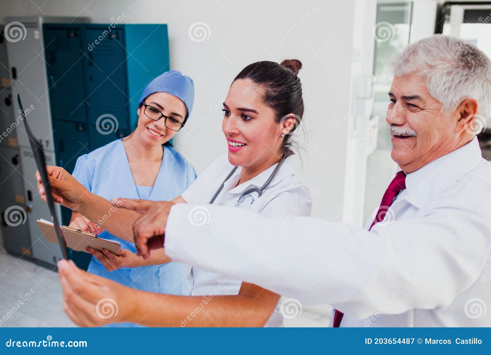 Group of Latin Doctors Looking a Radiography in a Hospital Stock Image ...