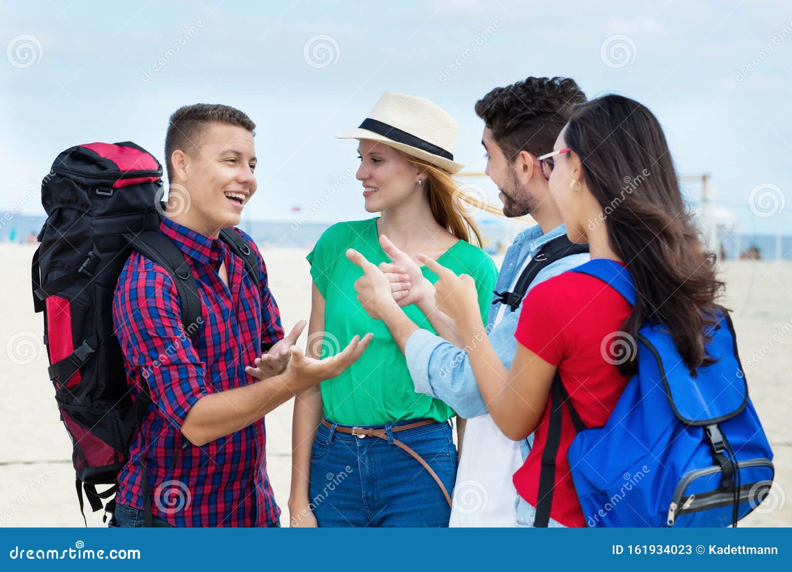 Group of Laughing American Backpacker and Tourists Stock Image - Image ...