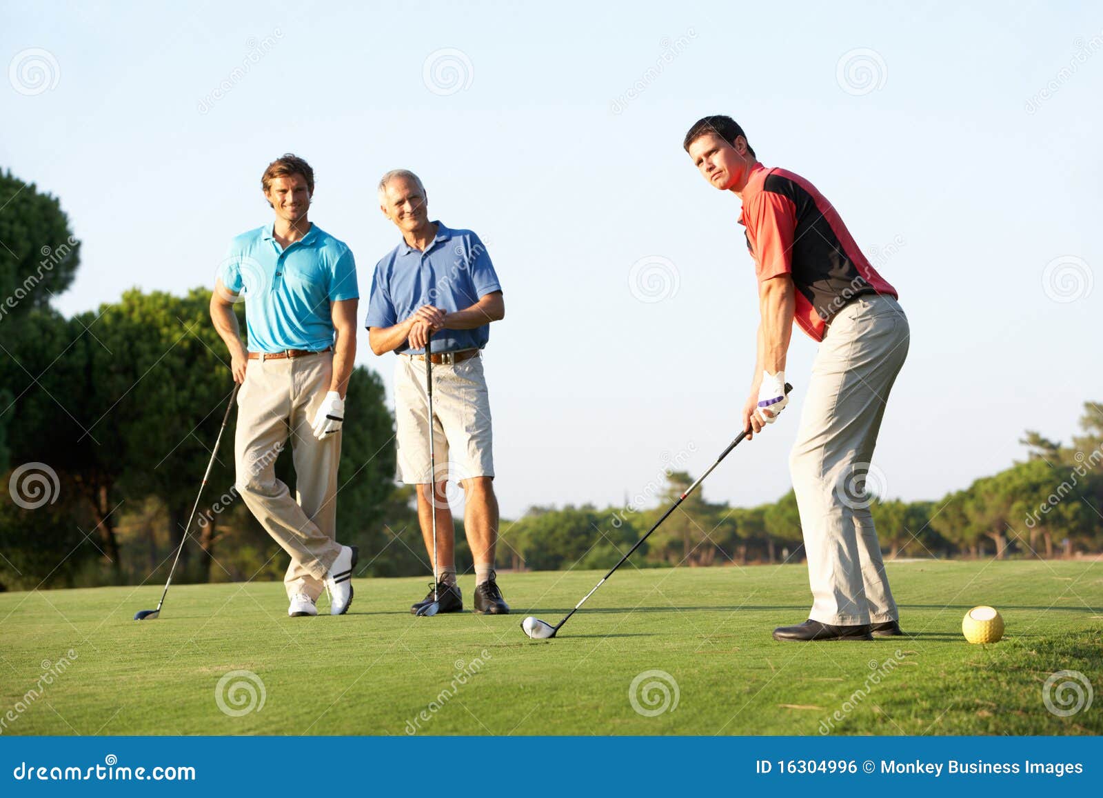 Group of Male Golfers Teeing Off Stock Photo - Image of length, retired ...