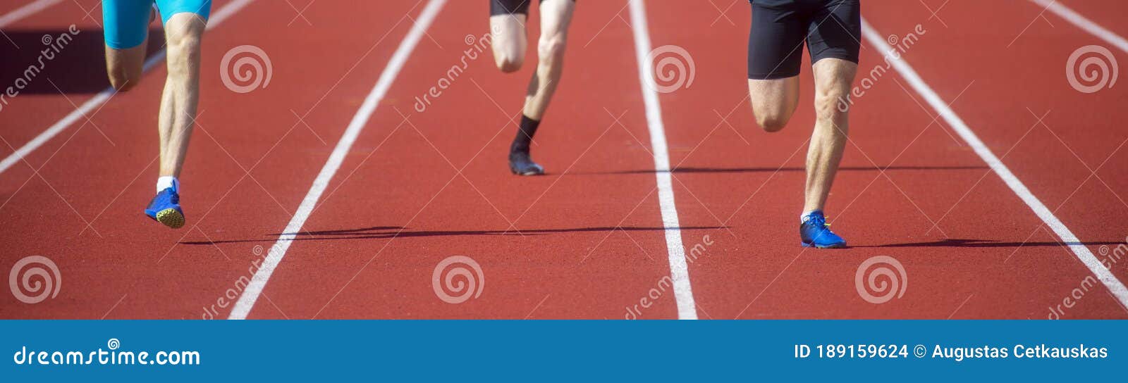 Sprinters Feet Wearing Runners Shoes Standing On An Athletics Track ...