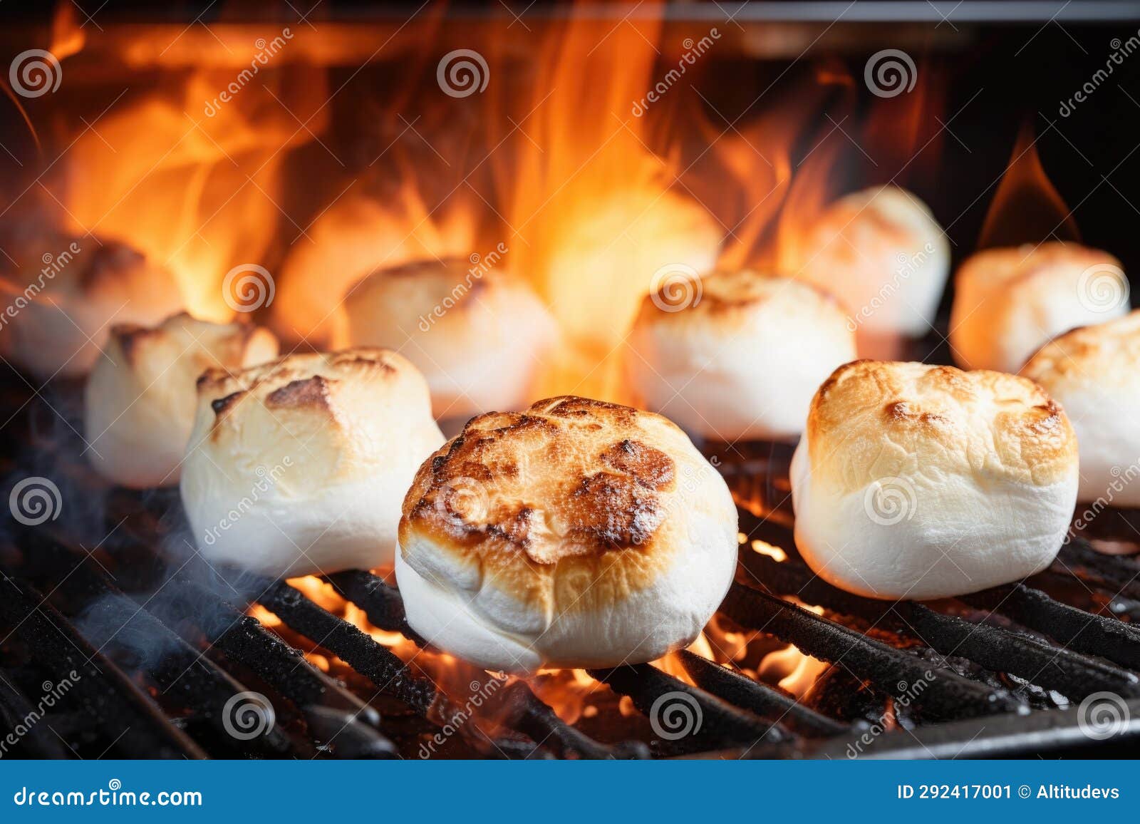 A Group of Marshmallows, Mid-roast Over Flickering Flames Stock Image ...