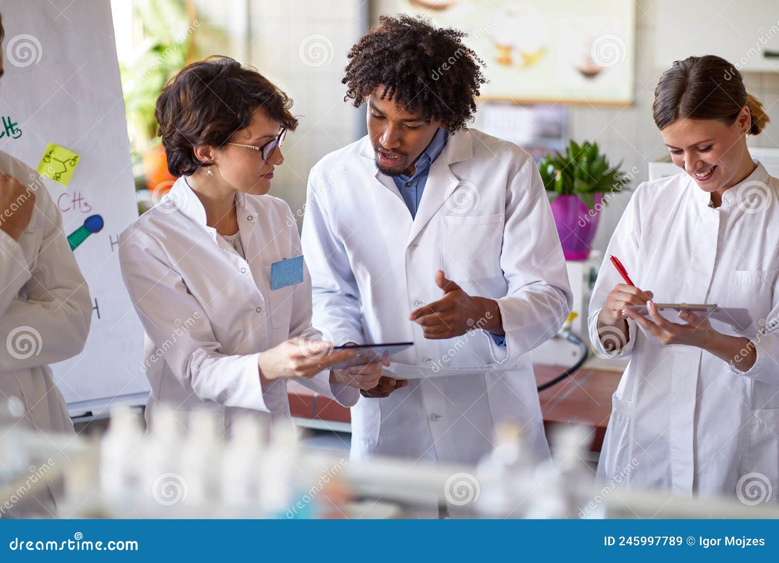 Group of Medical Workers Working in Lab Stock Image - Image of ...