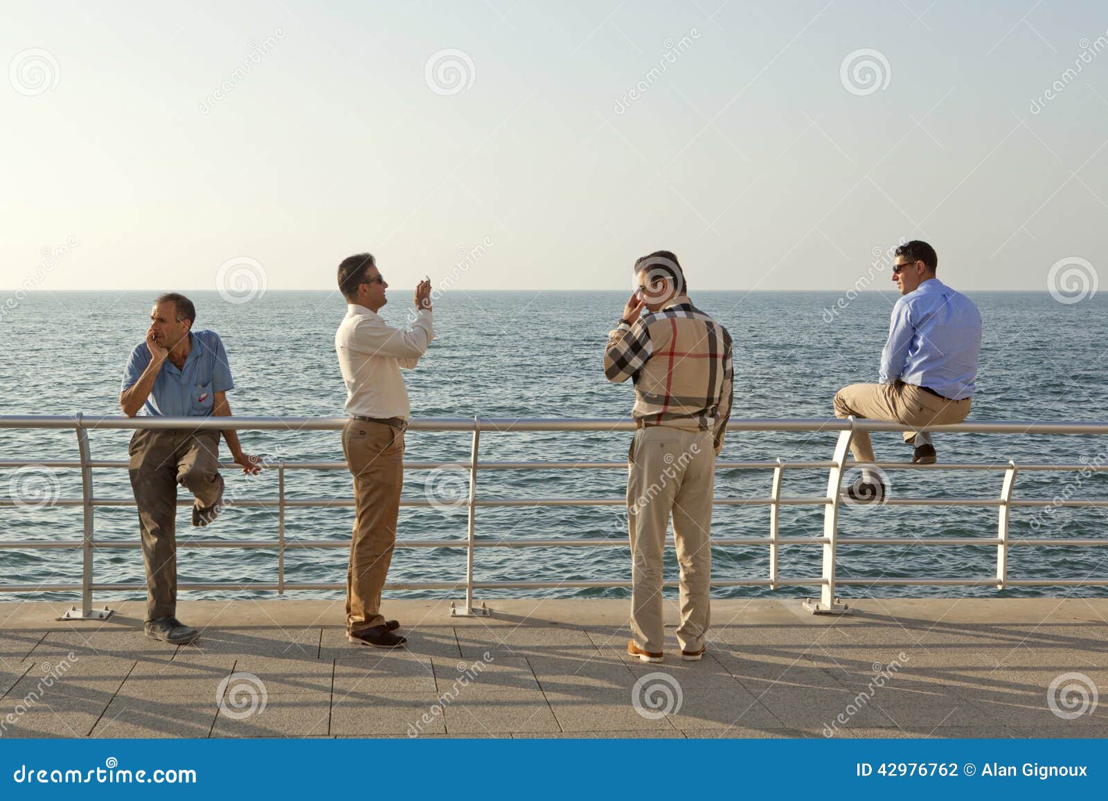 A group of men, Beirut editorial photography. Image of waterfront ...