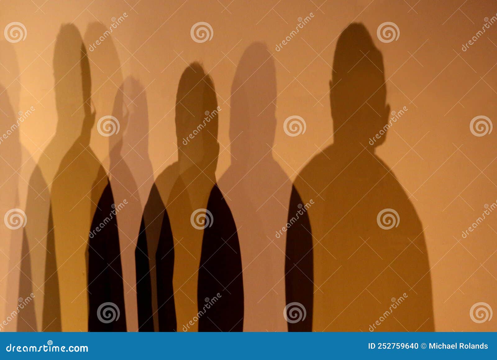Men Cast Shadows on a Wall stock photo. Image of abstract - 252759640