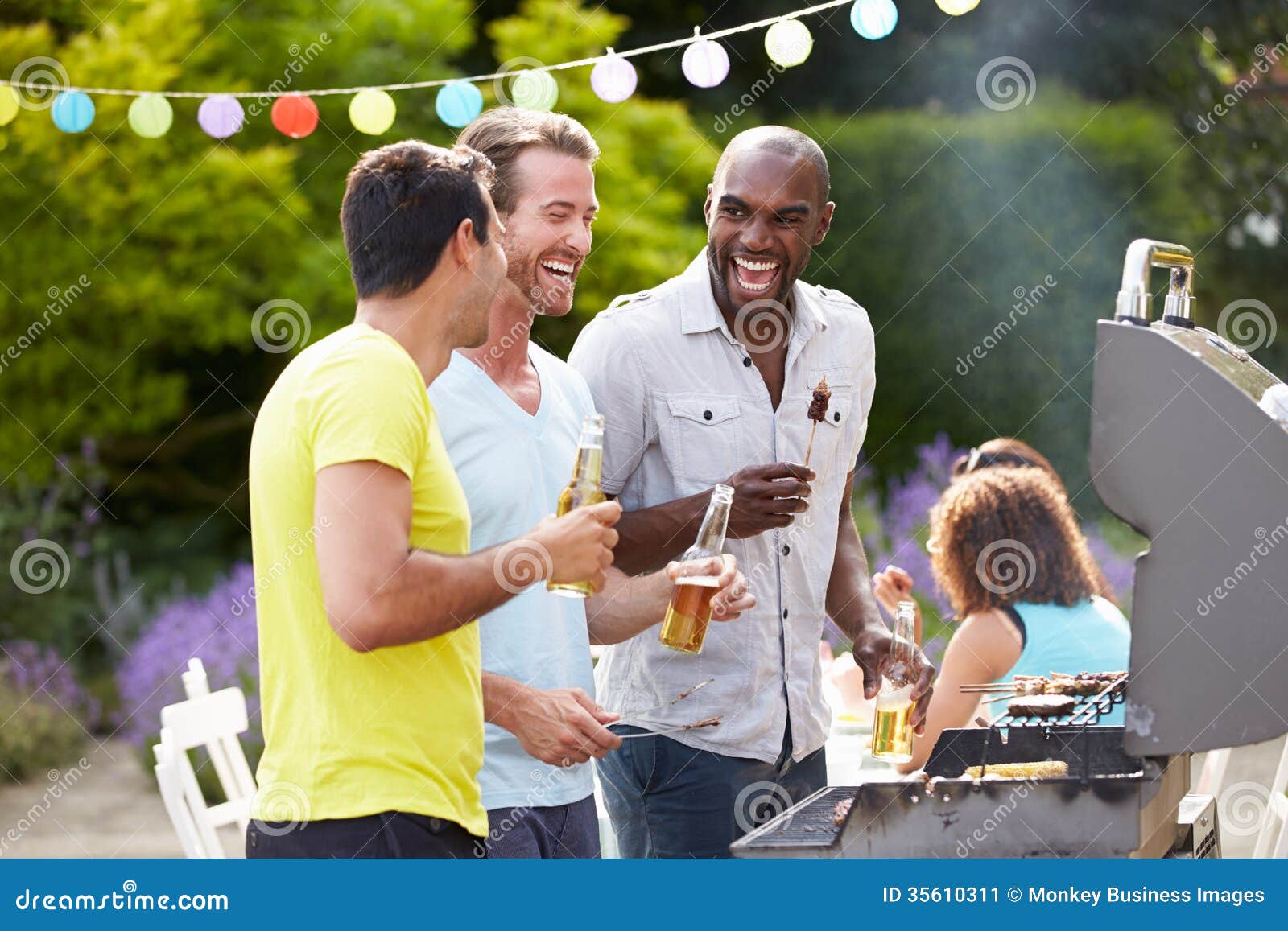 Group of Men Cooking on Barbeque at Home Stock Image - Image of bottle ...