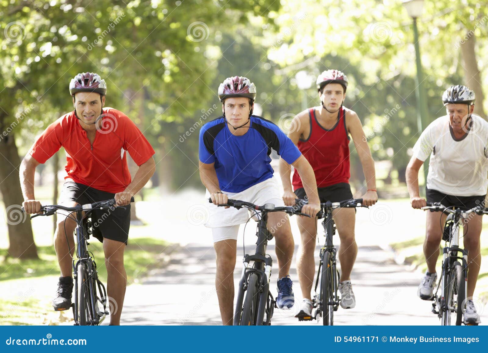 Group of Men on Cycle Ride through Park Stock Image - Image of friends ...