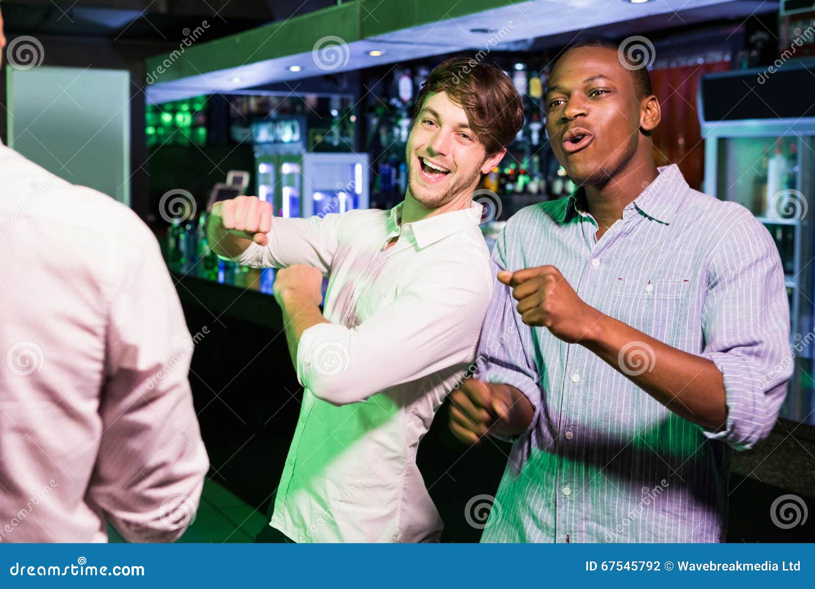 Group of Men Dancing Near Bar Counter Stock Photo - Image of indoors ...