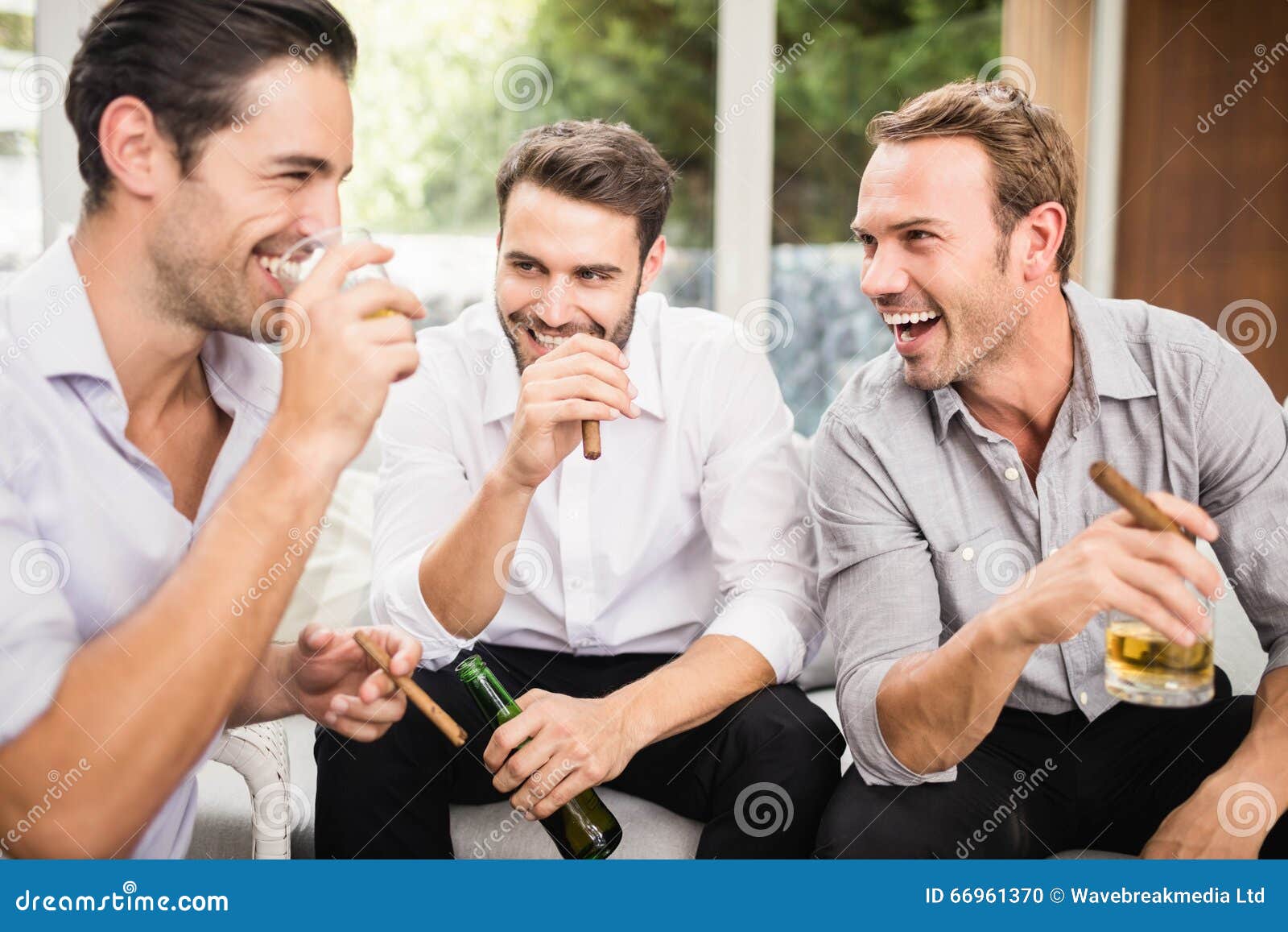 Group of men discussing stock photo. Image of indoors - 66961370