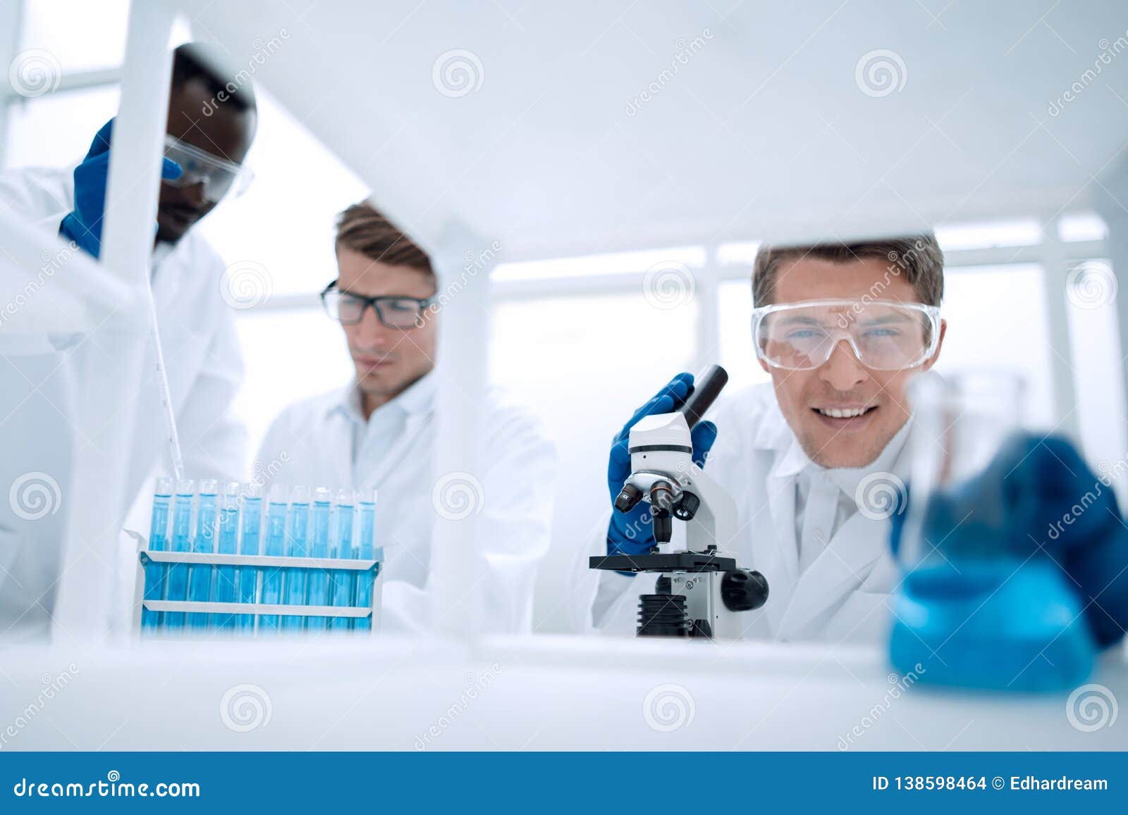 Group of Microbiologists in the Workplace in the Laboratory Stock Photo ...