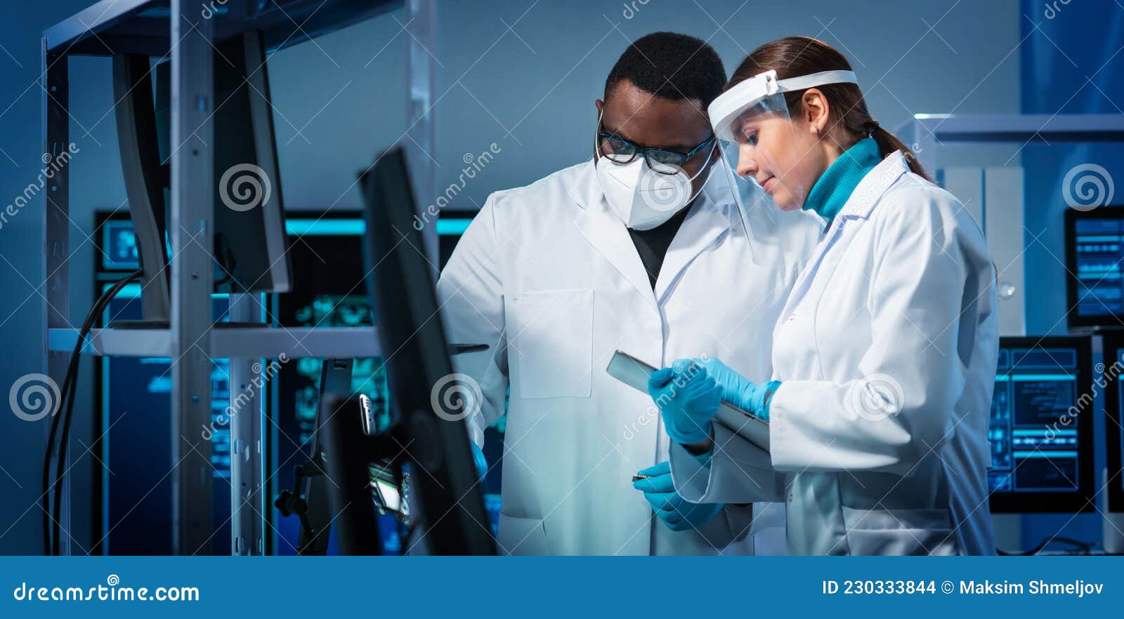 Group of Microelectronic Engineers Discussing in a Modern ...