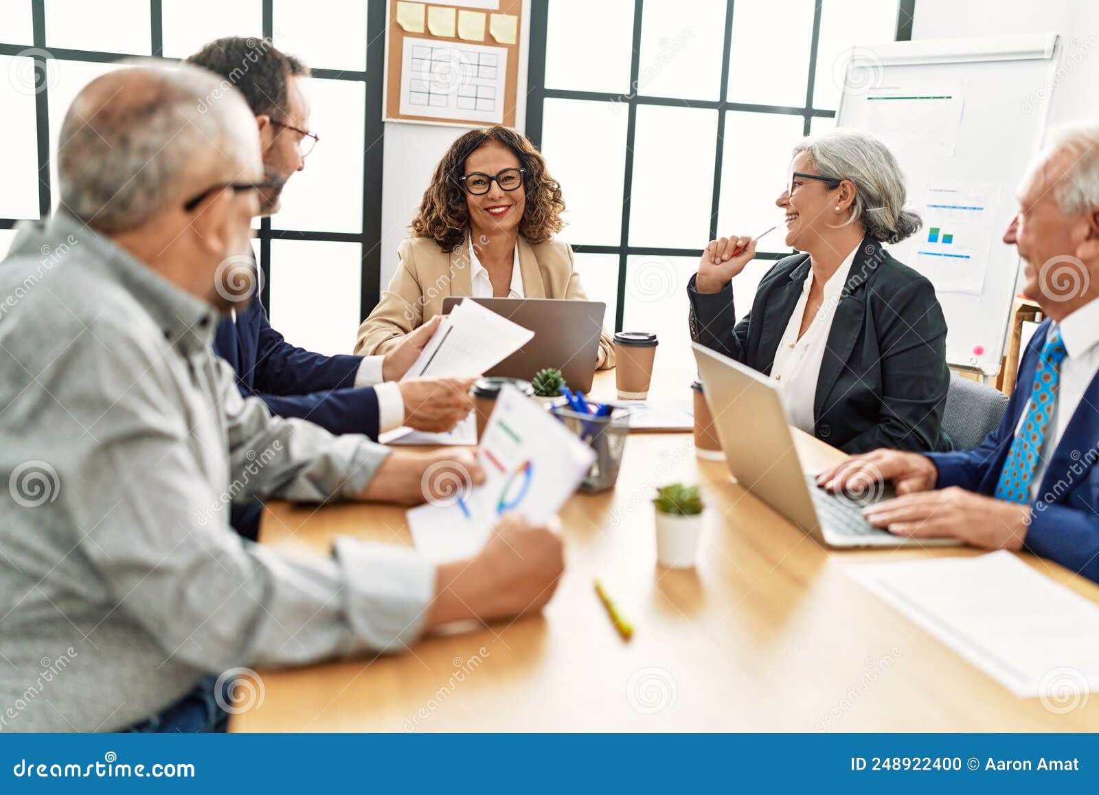 Group of Middle Age Business Workers Smiling Happy Working at the ...