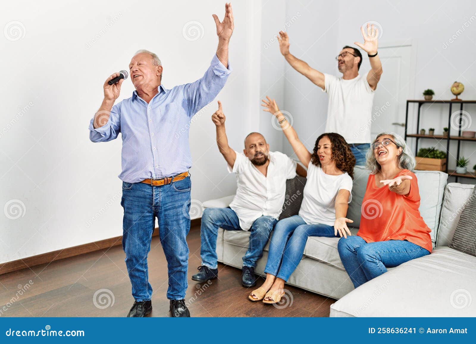 Group of Middle Age Friends Having Party Singing Song Using Microphone ...