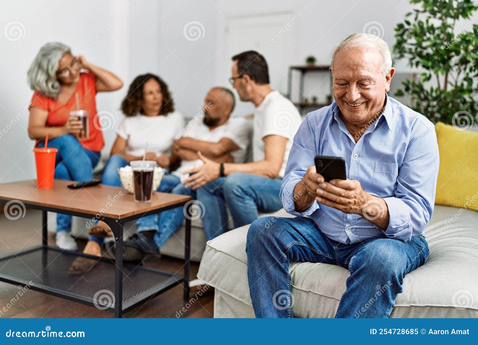Group of Middle Age Friends Sitting on the Sofa Speaking Stock Image ...