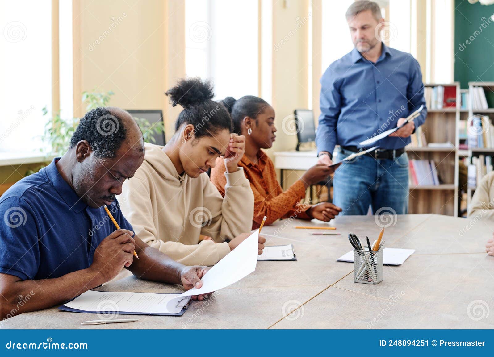 Migrants Doing Language Test Stock Image - Image of young, class: 248094251