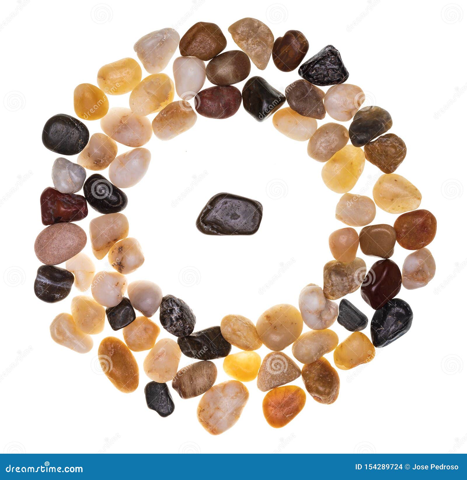 Group of Multi-colored Stones Multicolored Surrounding an Individual ...