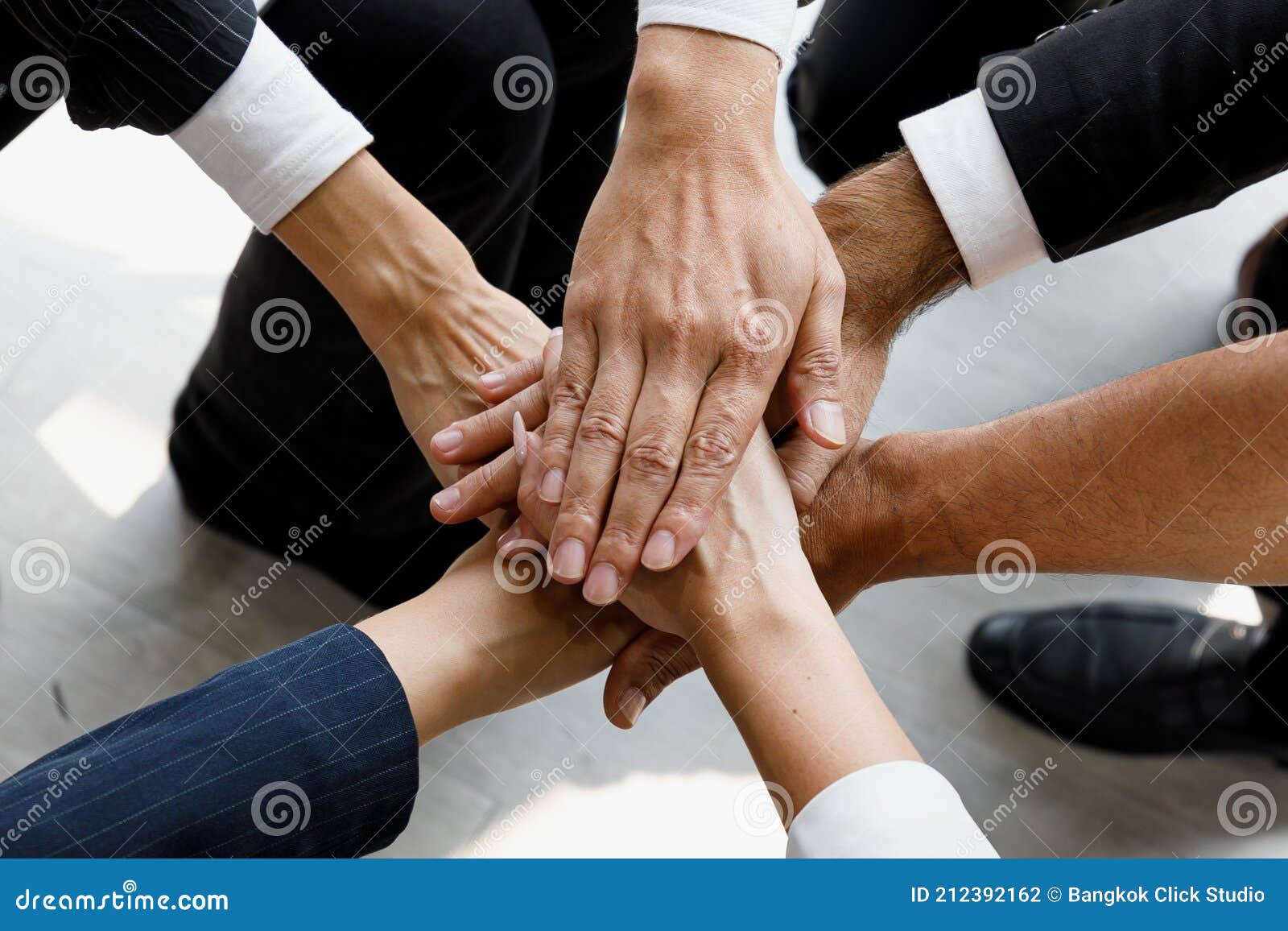 Group of Multi Colors Hands Stack Together and Smiling in the Symbol of ...