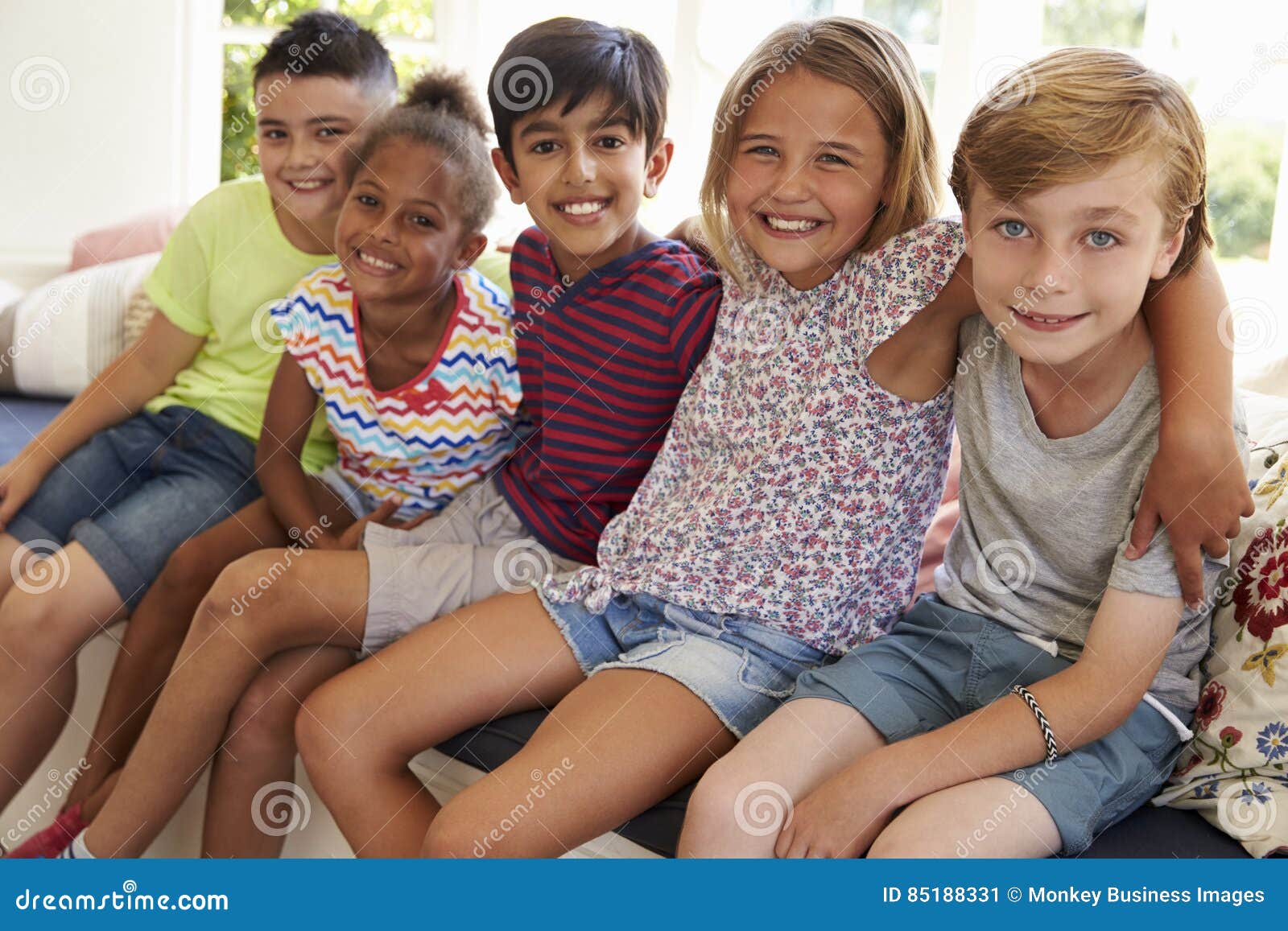 Group of Multi-Cultural Children on Window Seat Together Stock Image ...