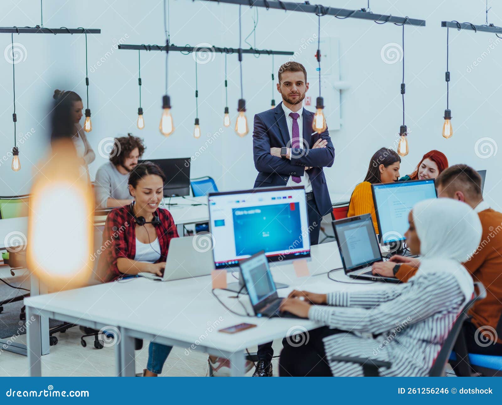 Group of Multi-ethnic Colleagues Working on Desktop Computers, Laptop ...