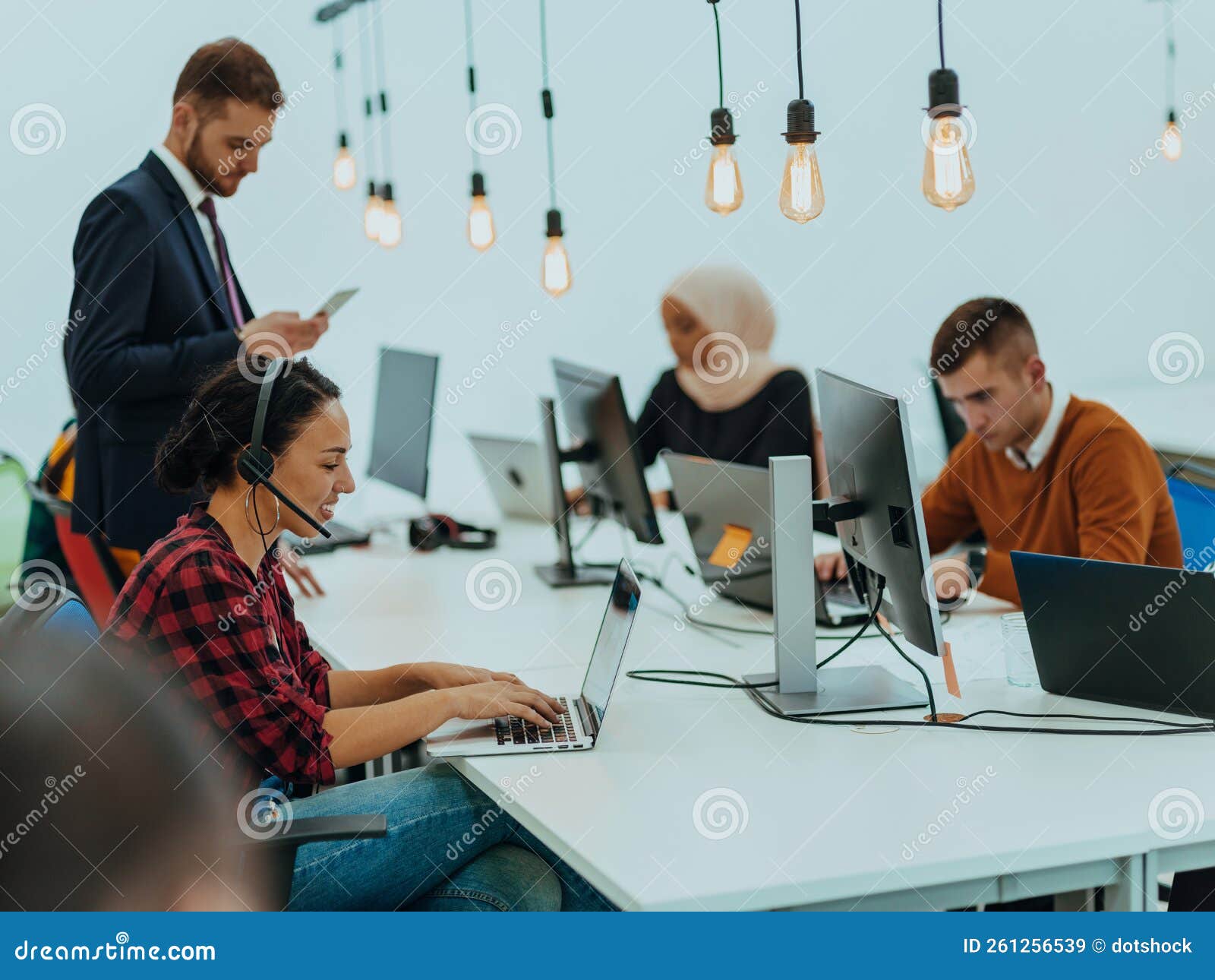 Group of Multi-ethnic Colleagues Working on Desktop Computers, Laptop ...