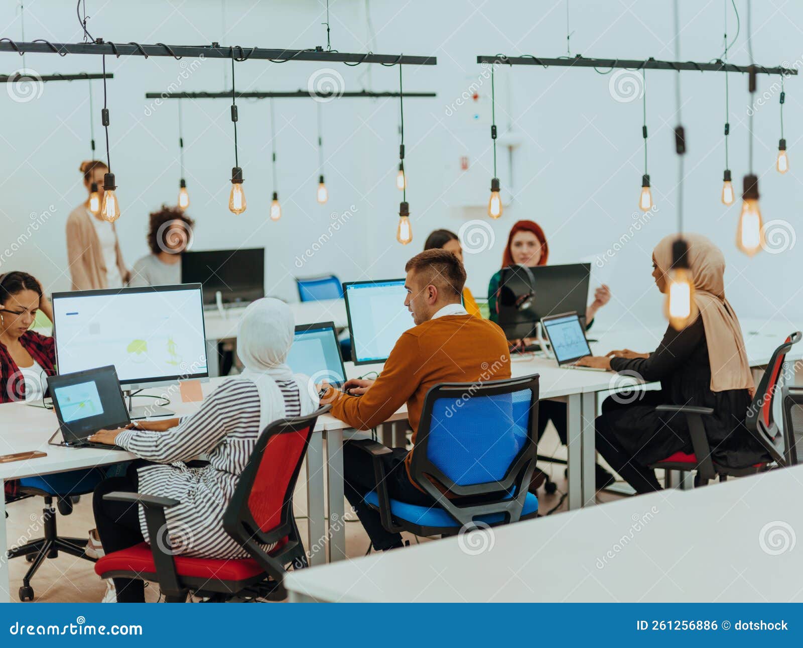 Group of Multi-ethnic Colleagues Working on Desktop Computers, Laptop ...