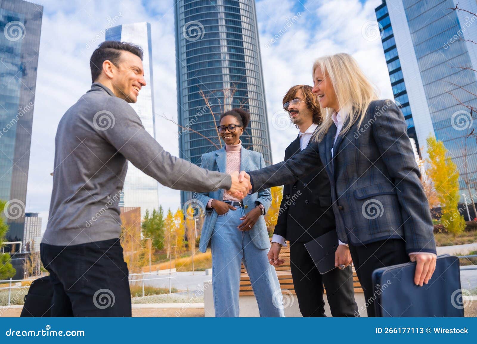 Group of Multi-ethnic Fellow Businessmen or Executives Introducing Each ...