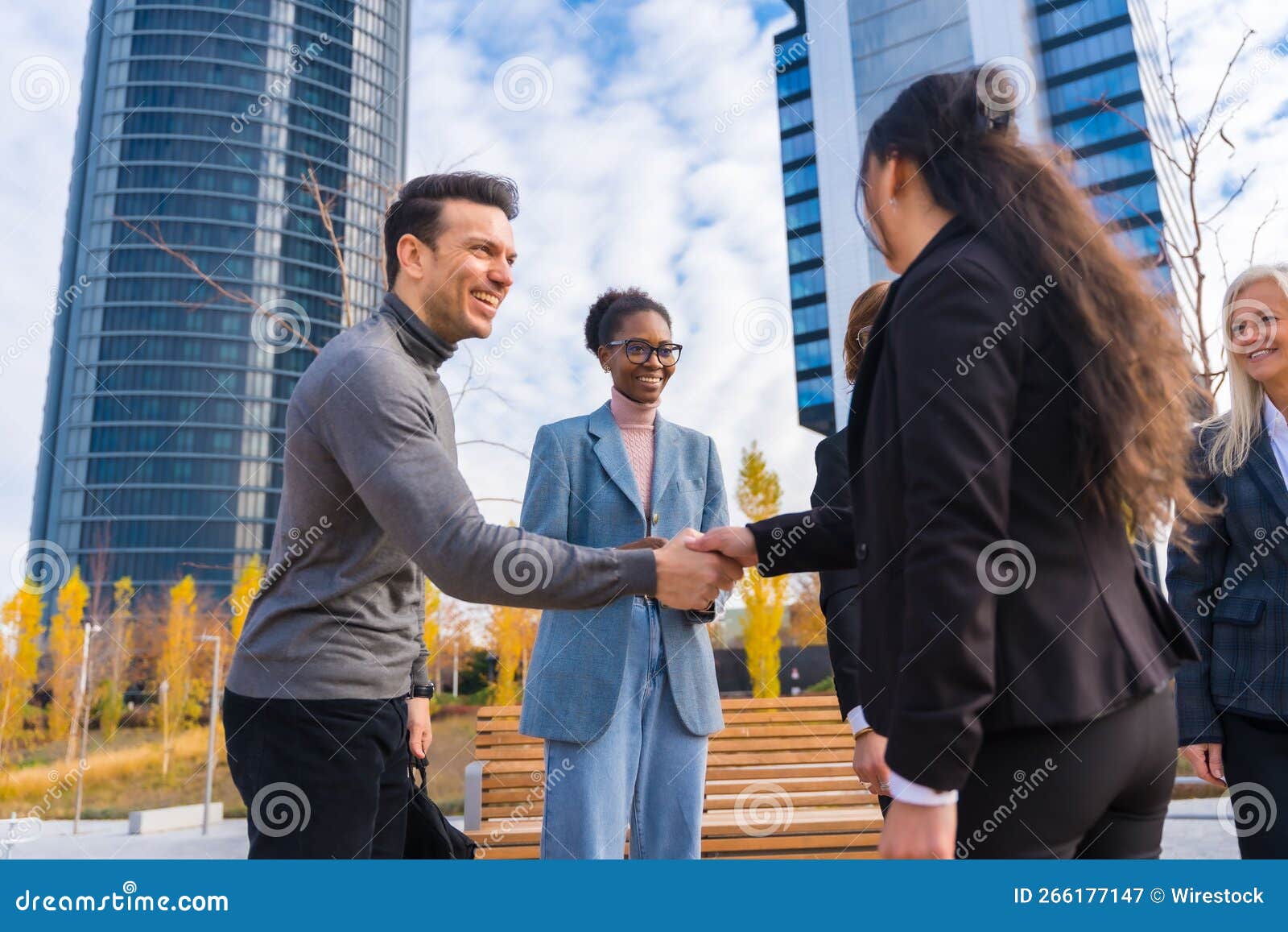 Group of Multi-ethnic Fellow Businessmen or Executives Introducing Each ...
