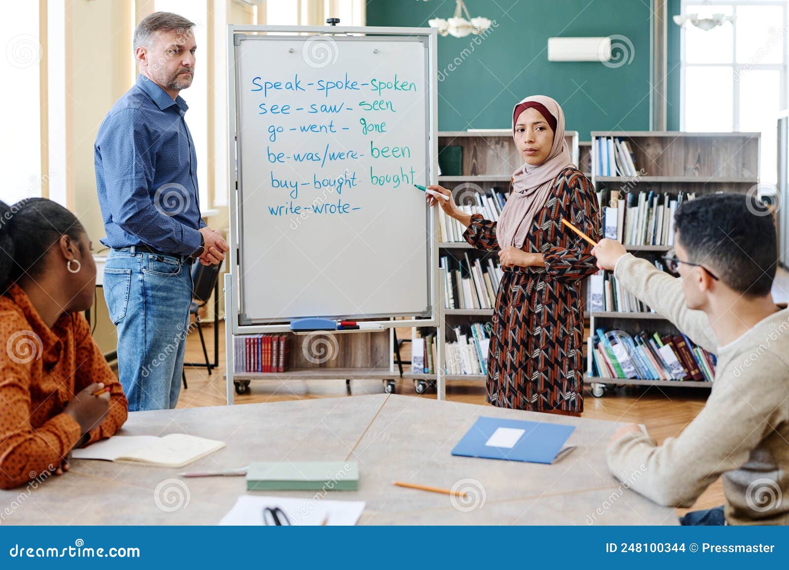 Classmates Helping Student To Finish Task Stock Photo - Image of help ...