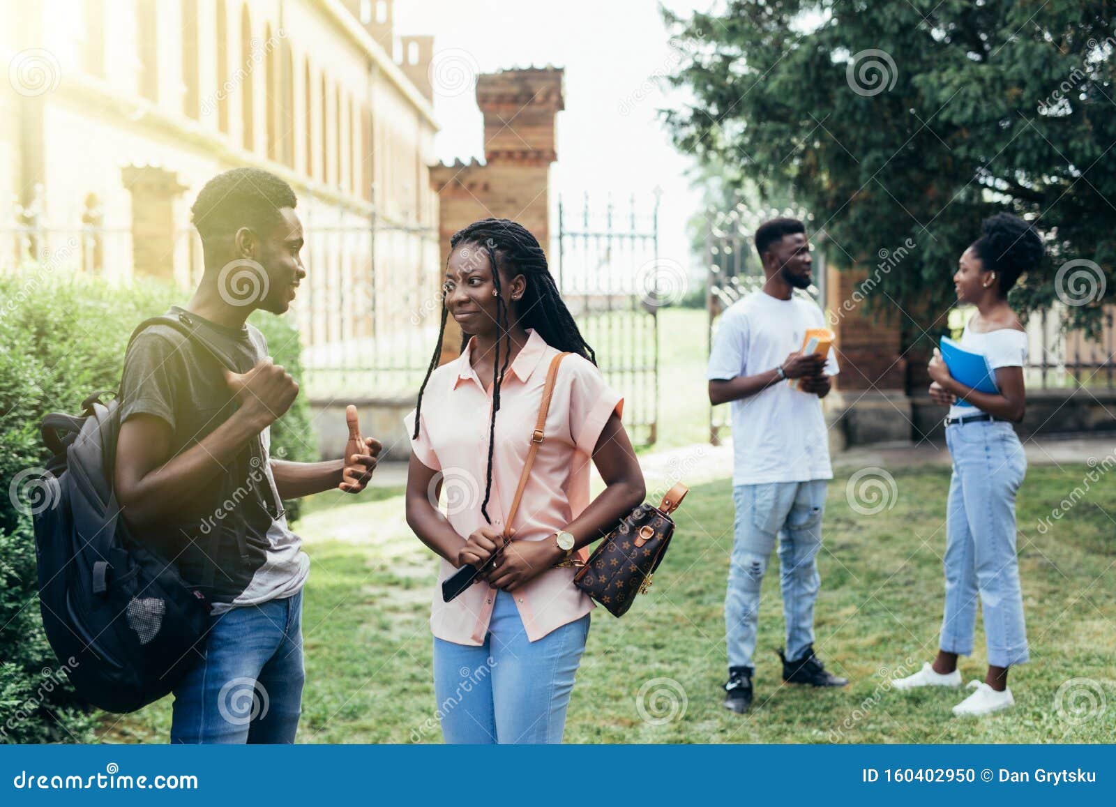 Group of Multi Ethnic Students Talking about Test Results in Summer ...