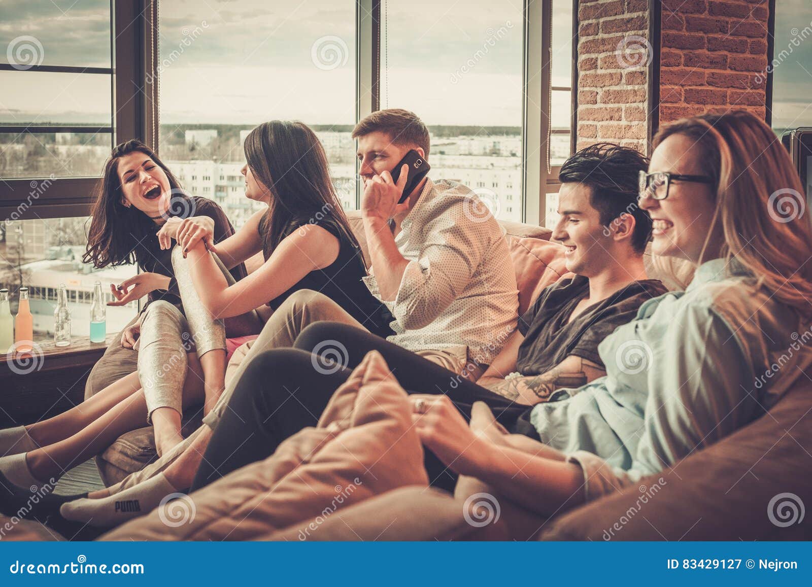 Group of Multi Ethnic Young Friends Having Fun in Home Interior Stock ...