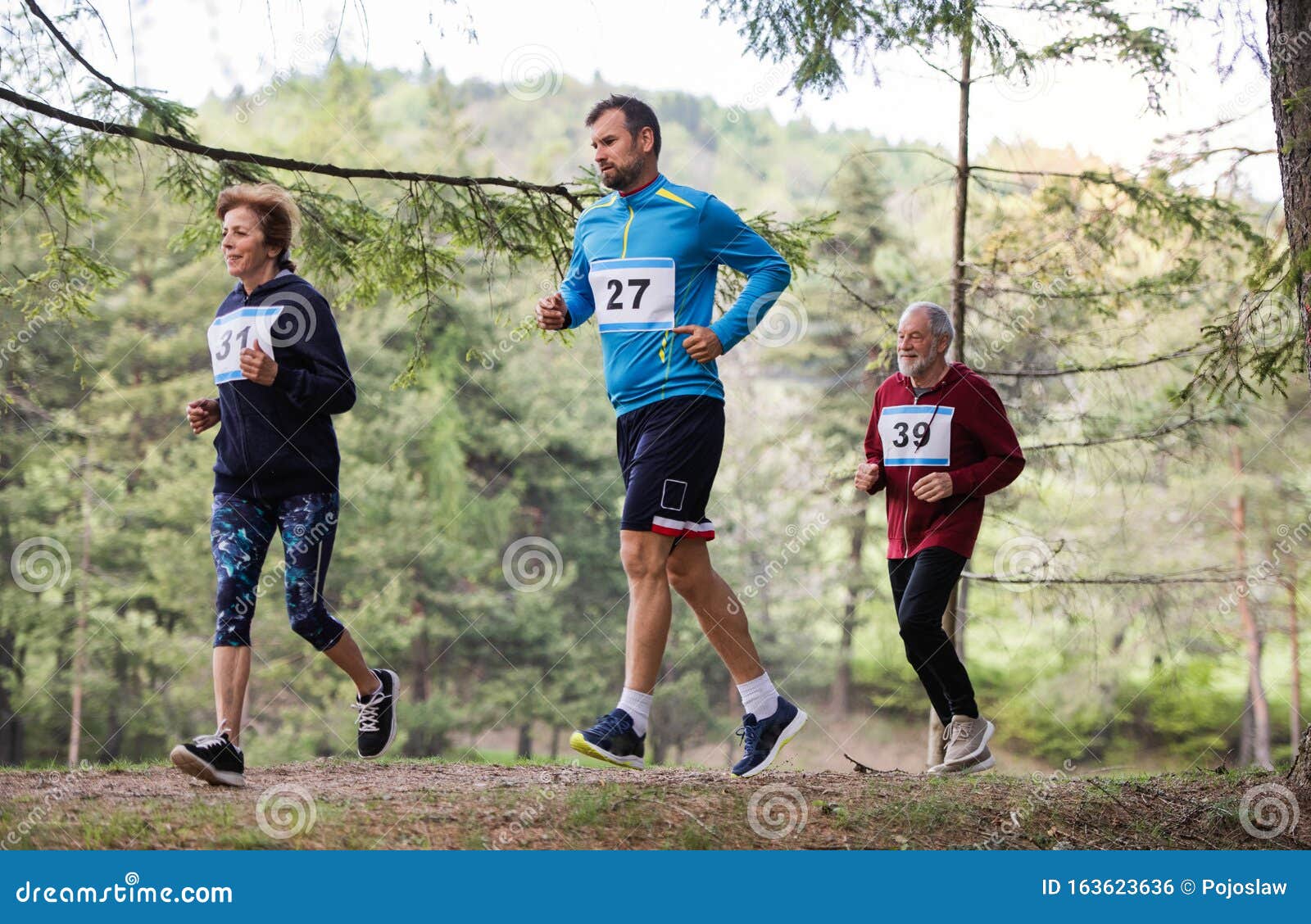 Group of Multi Generation People Running a Race Competition in Nature ...