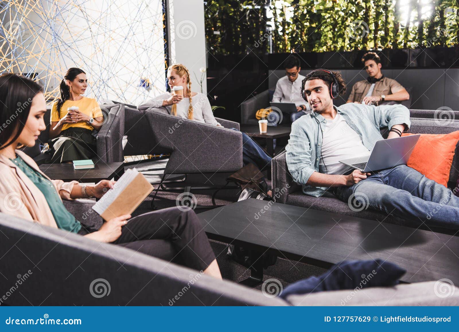 Group of Multicultural Business People Working and Talking at Modern ...