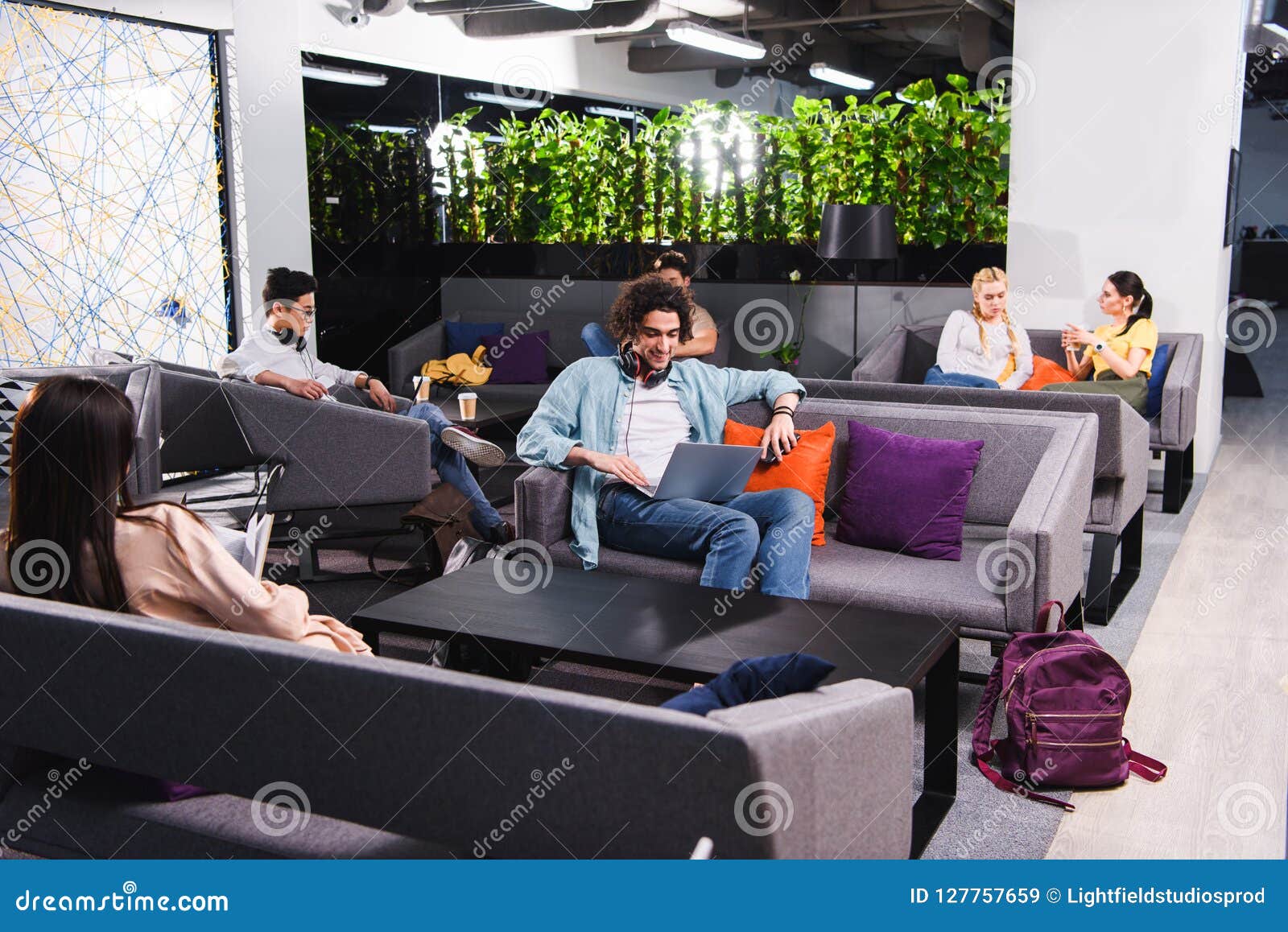 Group of Multicultural Business People Working and Talking at Modern ...