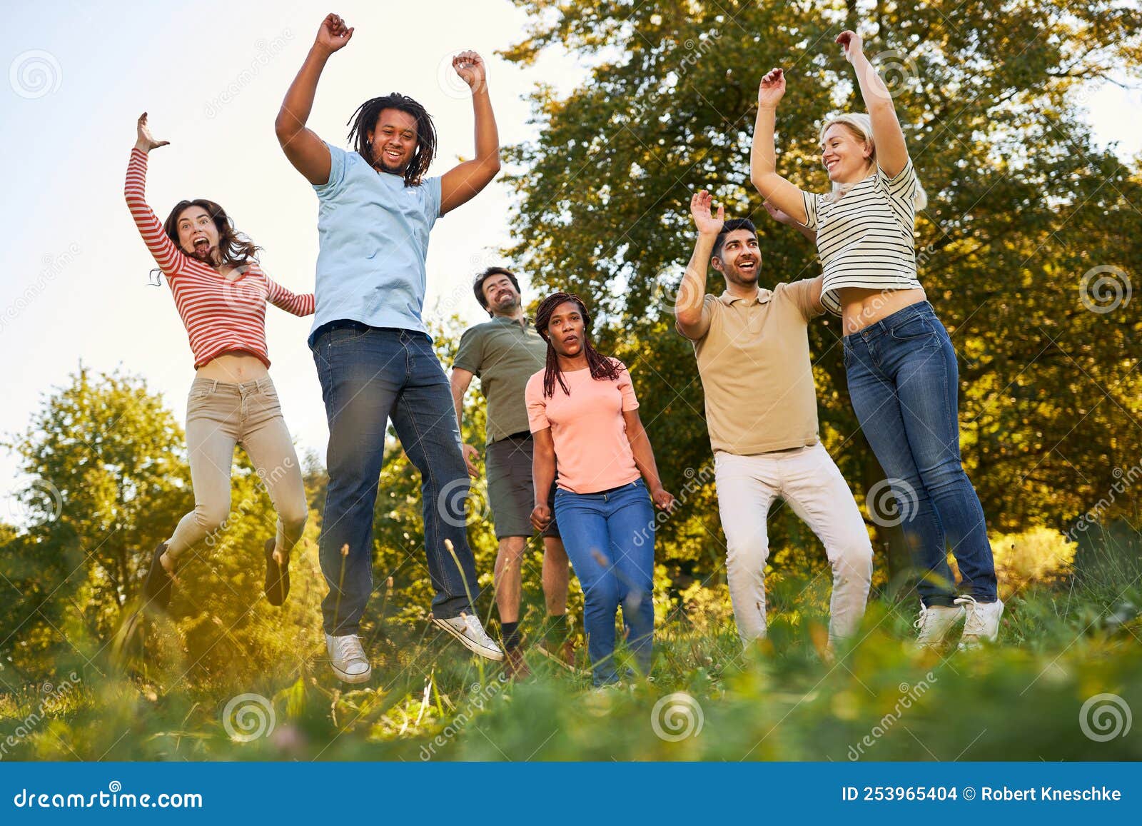 Group of Multicultural People Jumping and Cheering Stock Photo - Image ...