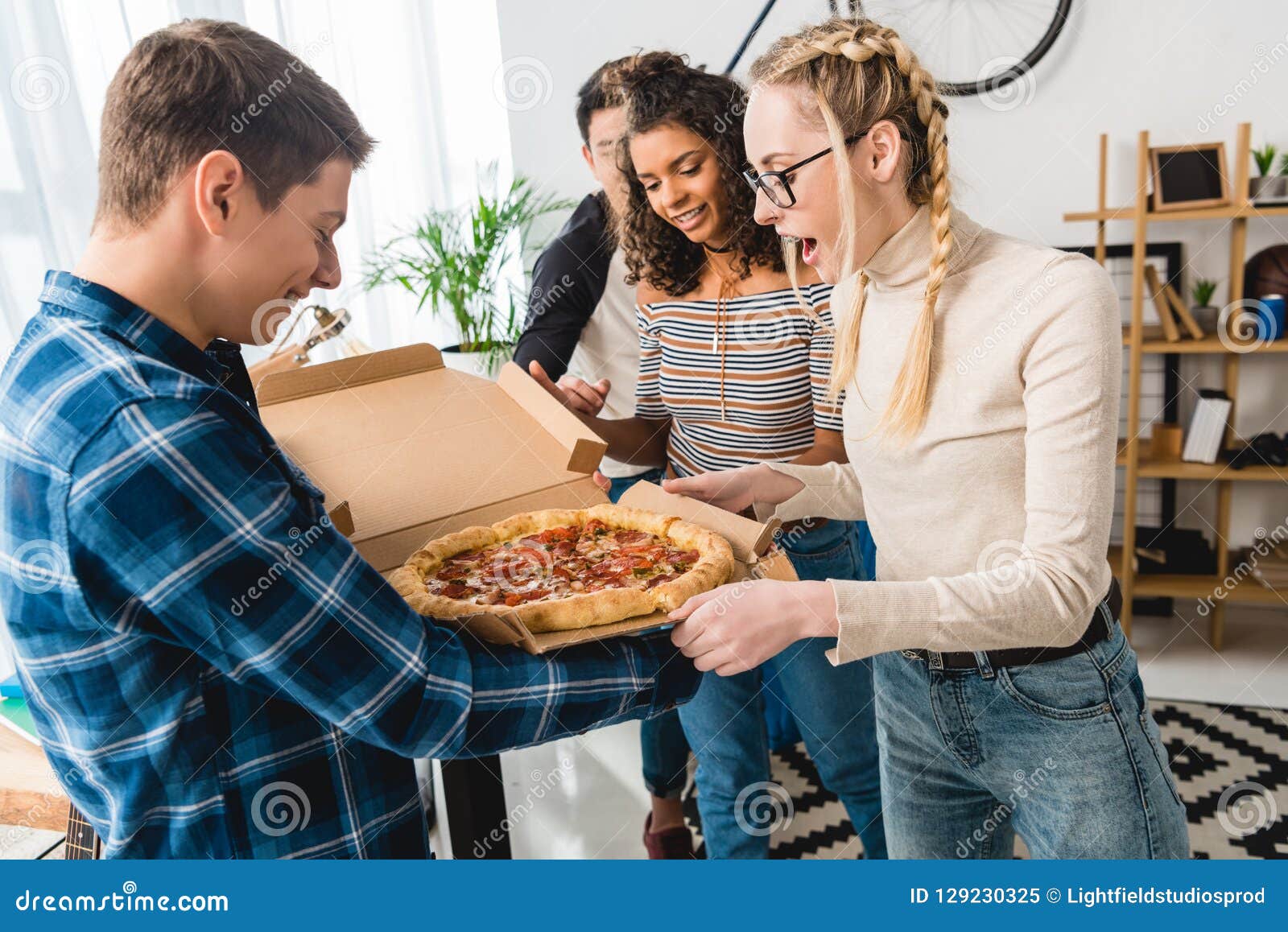 Group of Multicultural Teens Excited Stock Image - Image of home ...
