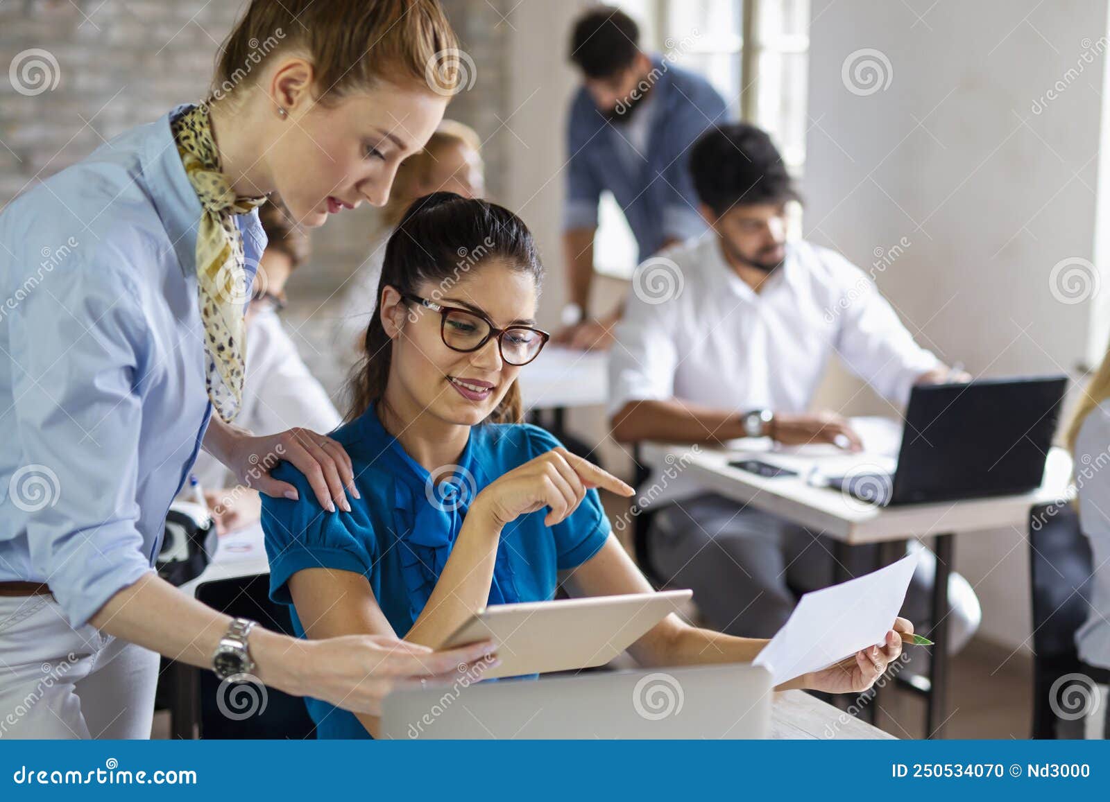 Group of Multiethnic Business People Cooperating during Business ... Group of Multiethnic Business People Cooperating during Business ...