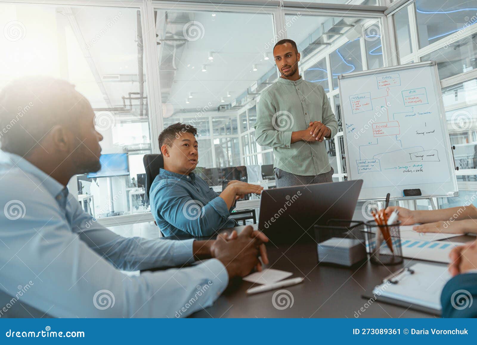Group of Multiethnic Business People Working Together on Project while ...