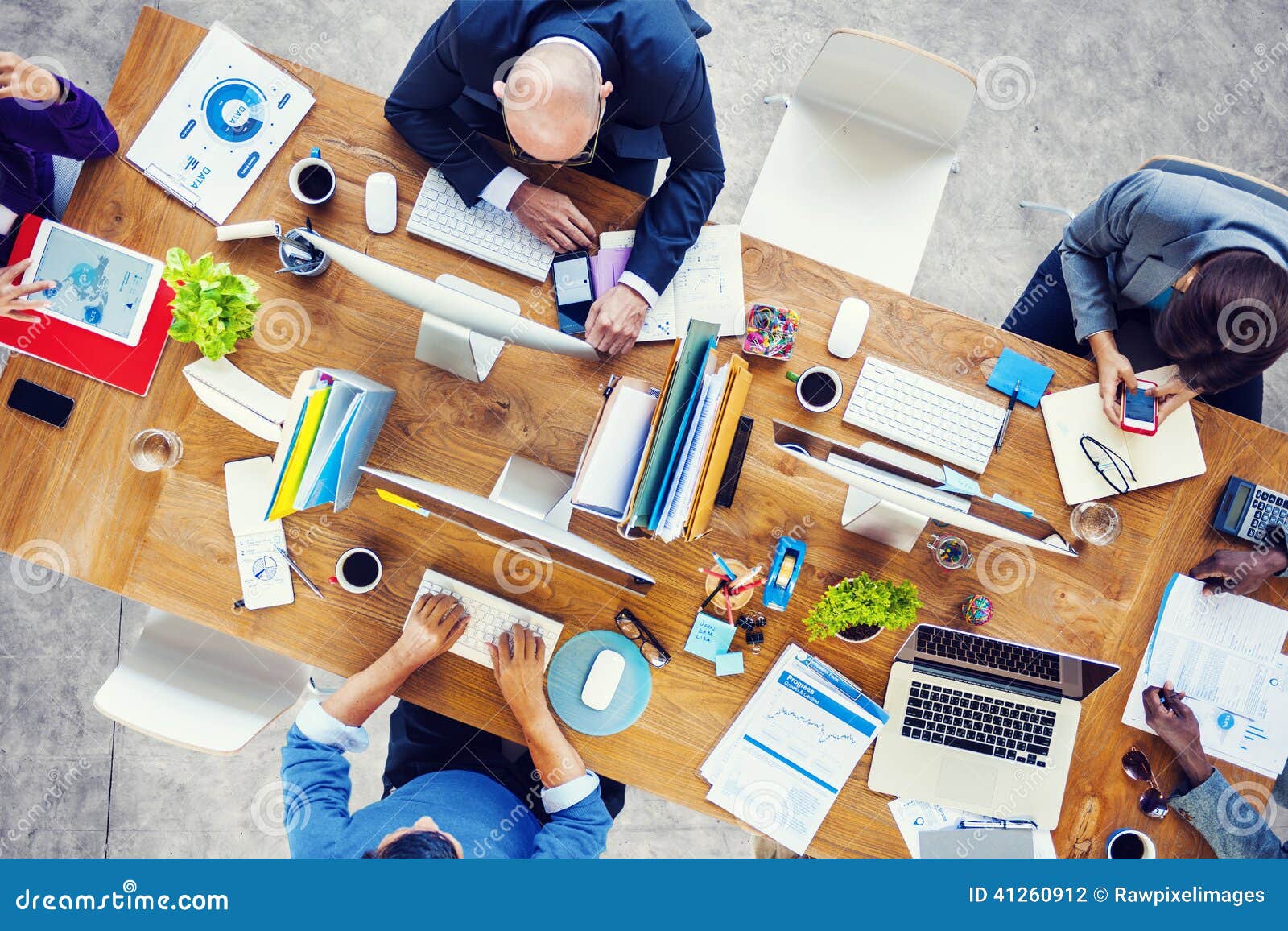 Group of Multiethnic Busy People Working in an Office Stock Photo ...