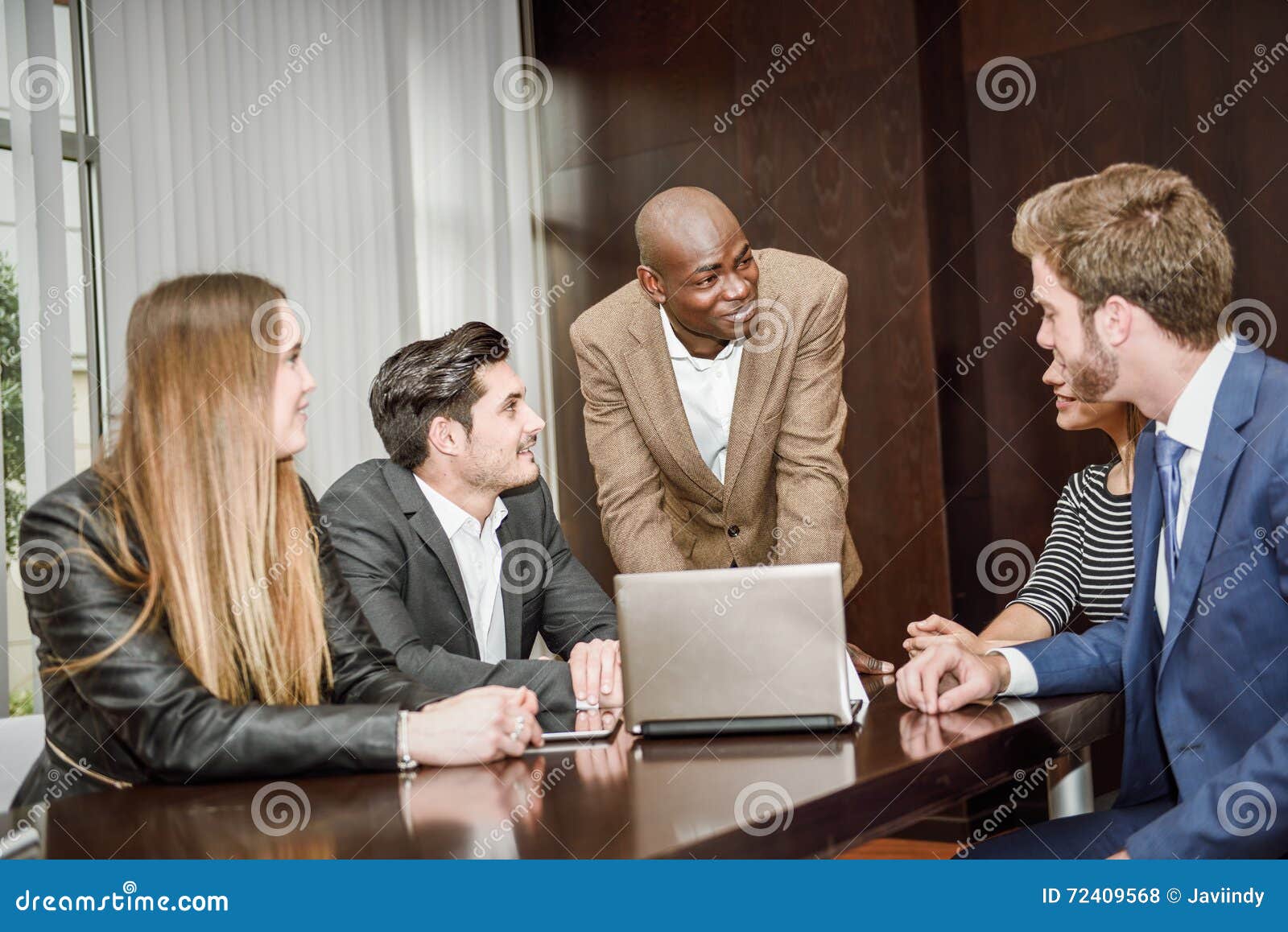 Group of Multiethnic Busy People Working in an Office Stock Photo ...