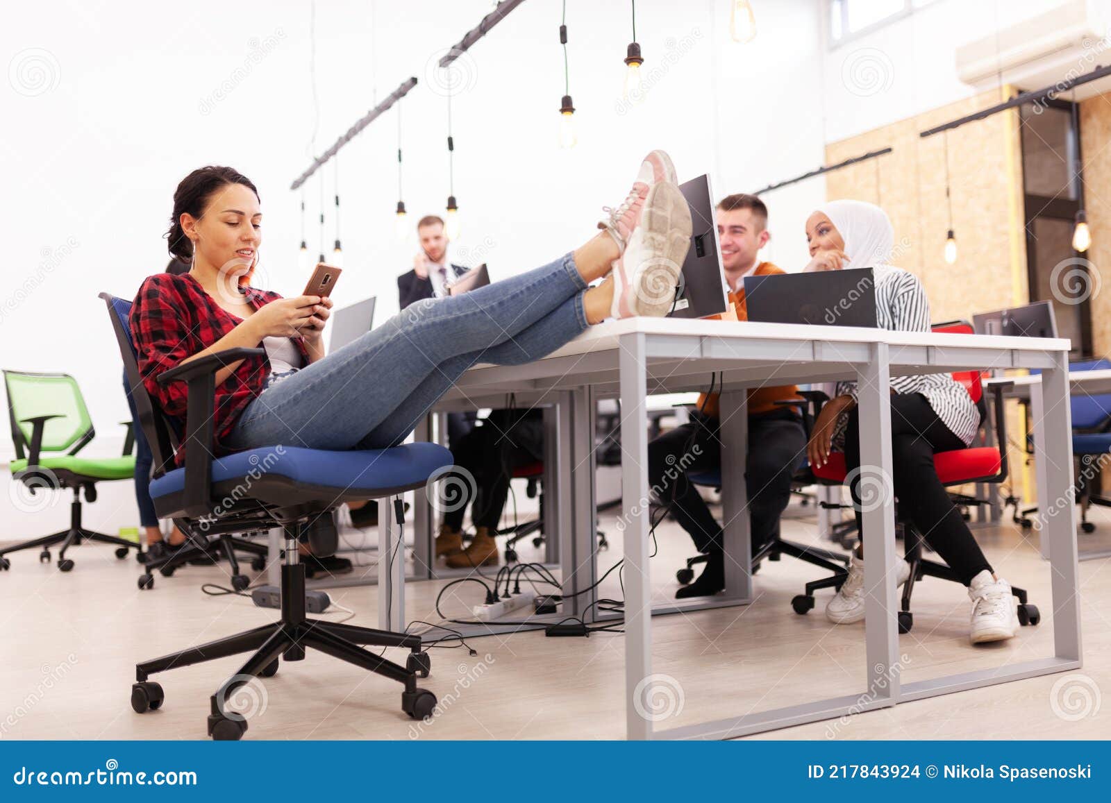 Group of Multiethnic Colleagues Working on Desktop Computers in a ...