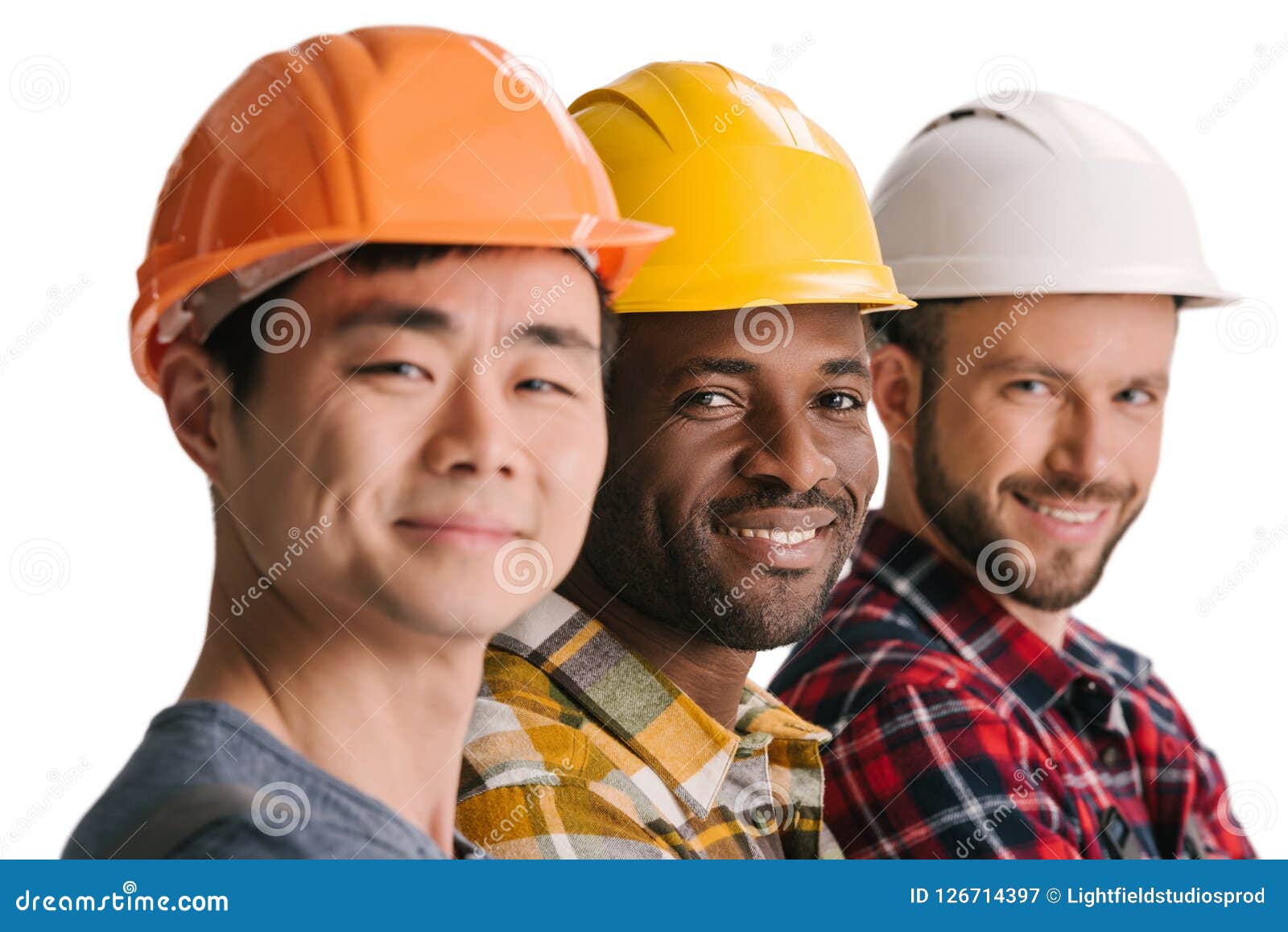 Group of Multiethnic Construction Workers in Row Looking Stock Image ...
