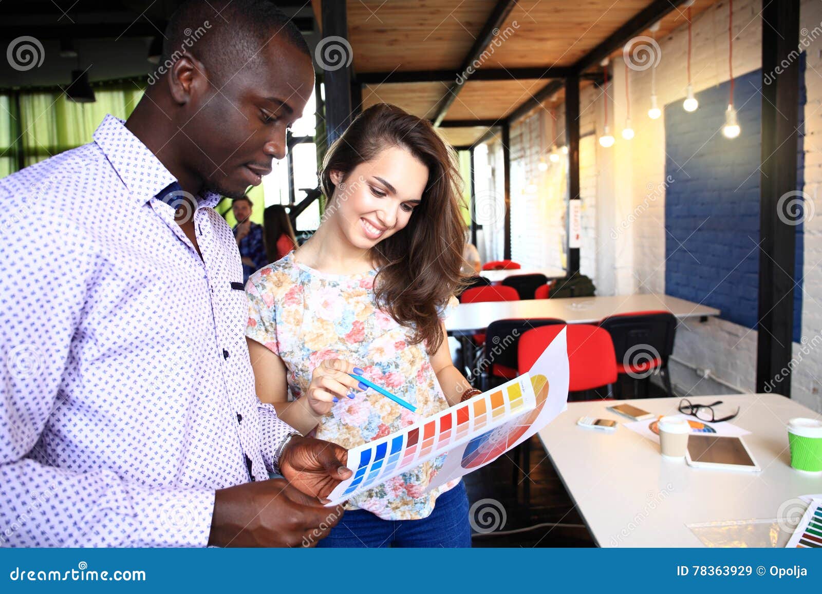 Group of Multiethnic Designers Brainstorming. Young Designers Working ...