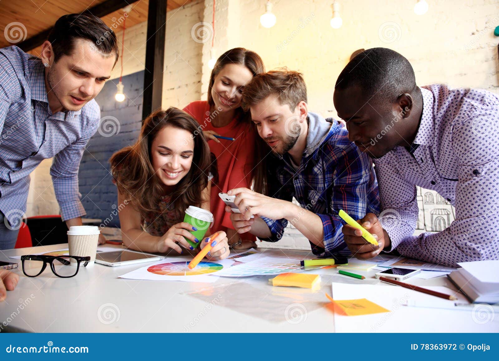 Group of Multiethnic Designers Brainstorming. Young Designers Working ...