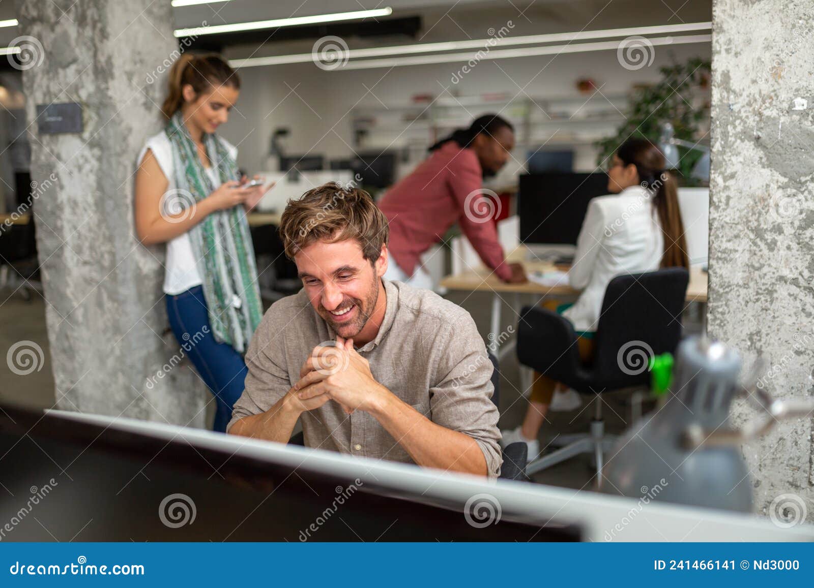 Group of Programmer Working in a Software Developing Company Office ...