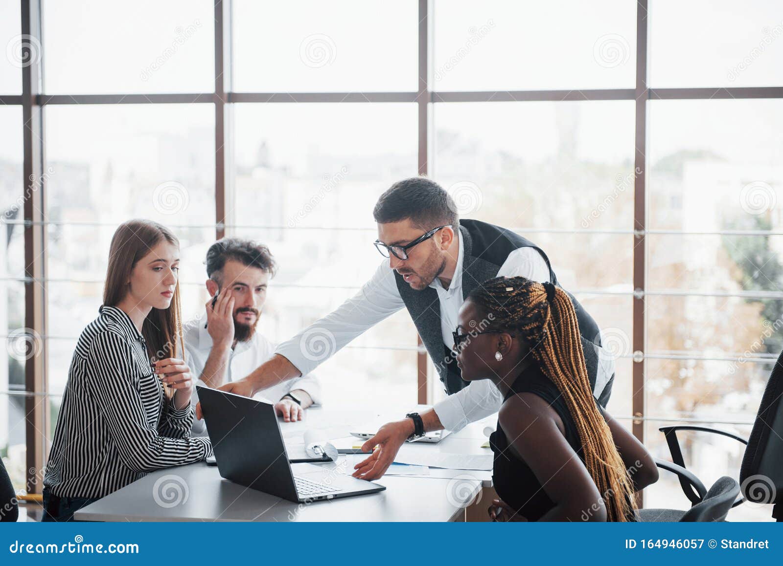 A Group of Multinational Busy People Working in the Office Stock Image ... A Group of Multinational Busy People Working in the Office Stock Image ...