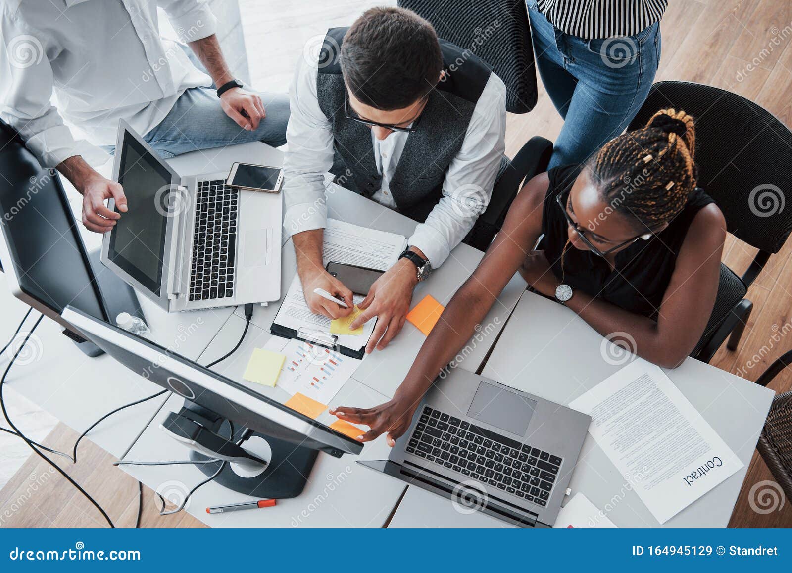 A Group of Multinational Busy People Working in the Office. Stock Image ...