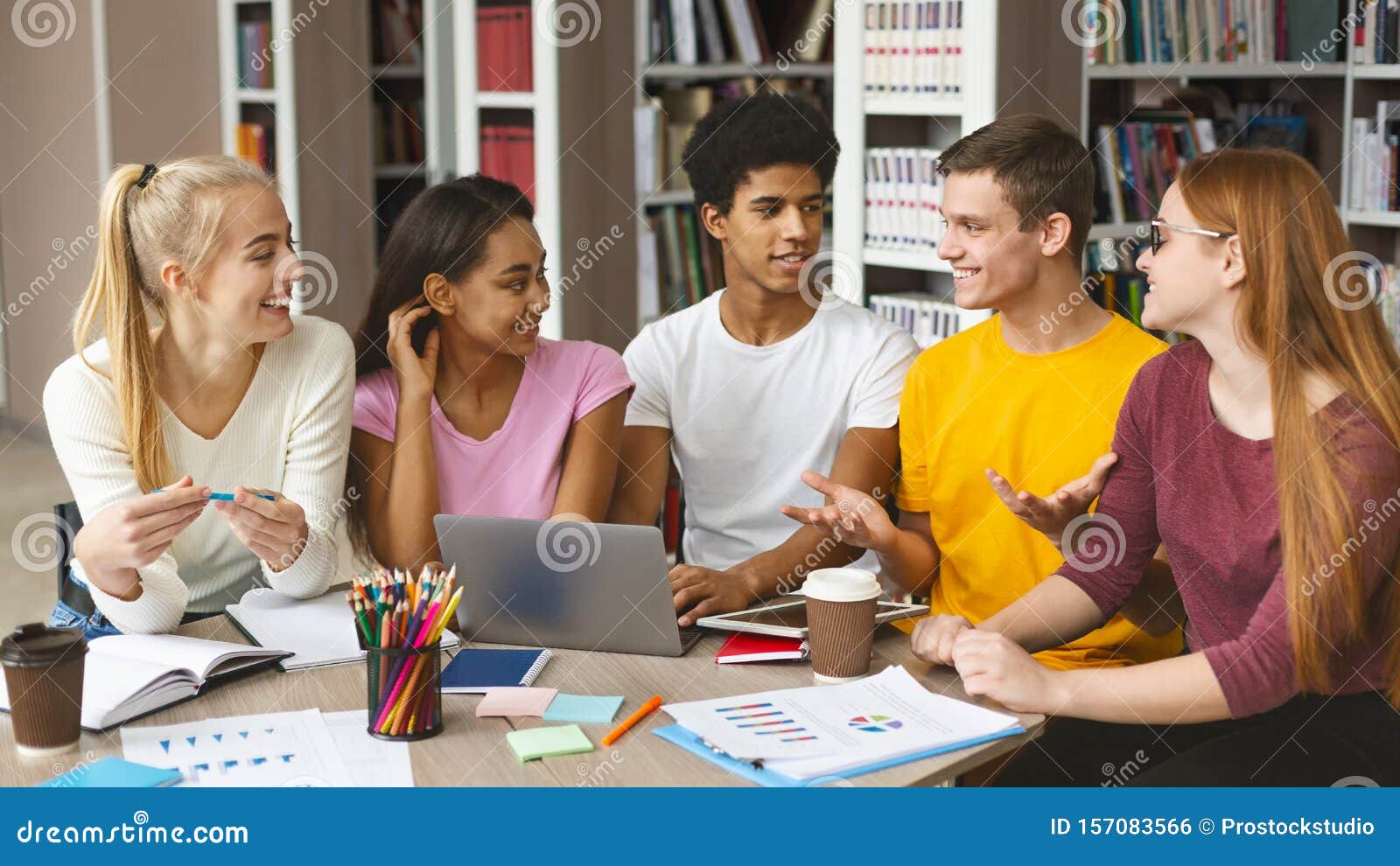 Group of Multinational Teenagers Working on Project at Library Stock ...