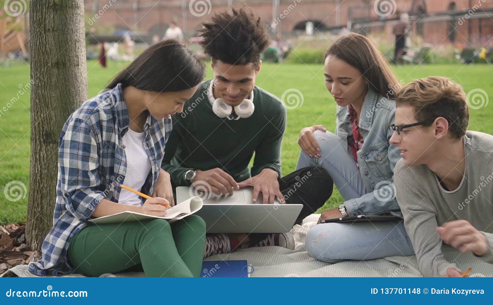 Group of Multiracial College Students Using Laptop Computer. Stock ...