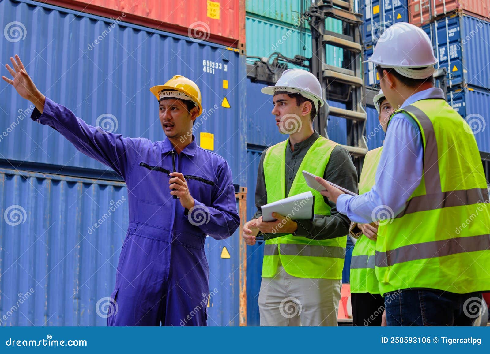 Group of Workers Teamwork at Logistics Terminal with Many Stacks of ...