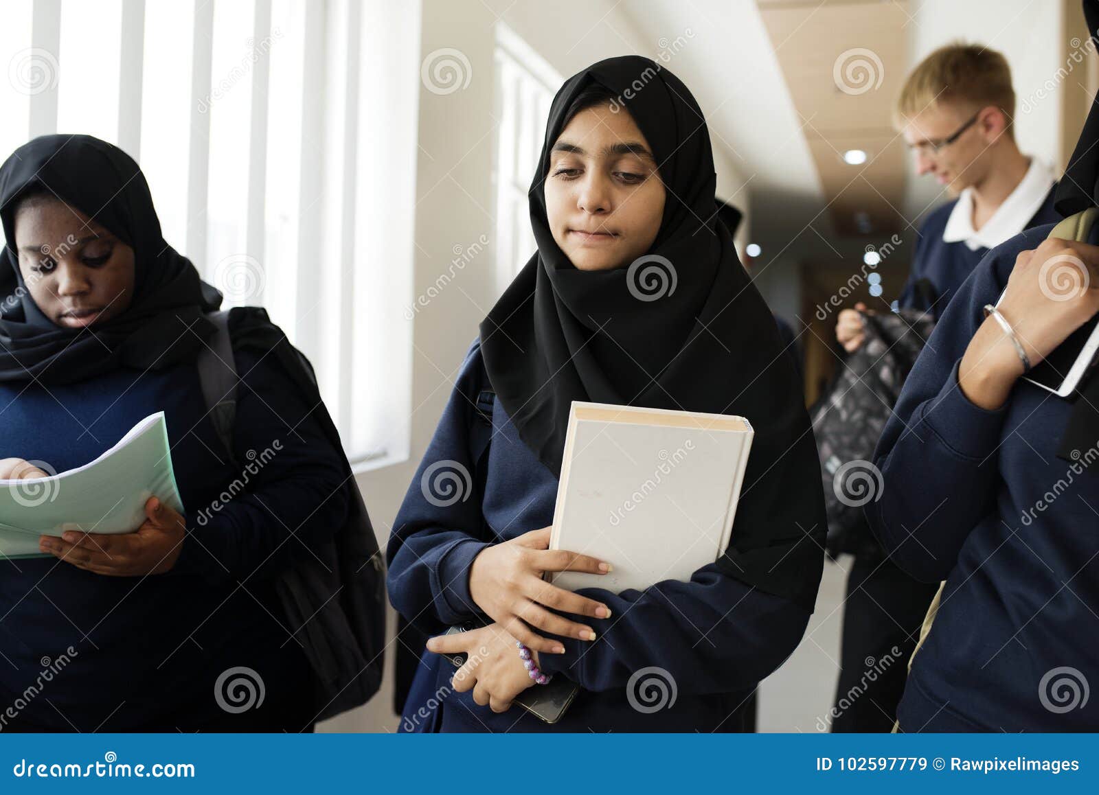 A group of Muslim students stock image. Image of hijab - 102597779